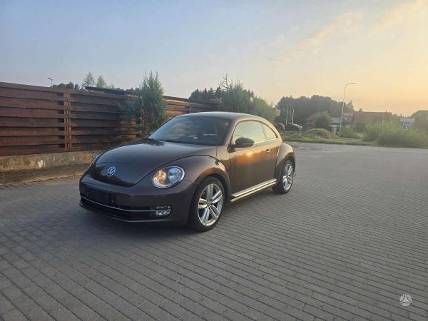 Brūns Volkswagen Beetle 2012 Kauņa, ar dzinēja tilpumu 1.60 L un nobraukumu 165 tūkst. km par 5999 €, foto 1 vietnē AUTOMOTO.COM.LV