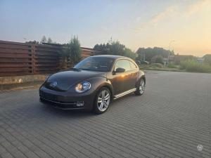 Brūns Volkswagen Beetle 2012 Kauņa, ar dzinēja tilpumu 1.60 L un nobraukumu 165 tūkst. km par 5999 €, foto  vietnē AUTOMOTO.COM.LV