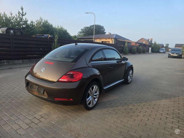 Brūns Volkswagen Beetle 2012 Kauņa, ar dzinēja tilpumu 1.60 L un nobraukumu 165 tūkst. km par 5999 €, foto 2 vietnē AUTOMOTO.COM.LV