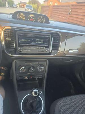 Brown Volkswagen Beetle 2012 in Kaunas, with an engine capacity of 1.60 L and mileage of 165 thousand km for 5999 €, photo 17 on AUTOMOTO.COM.LV