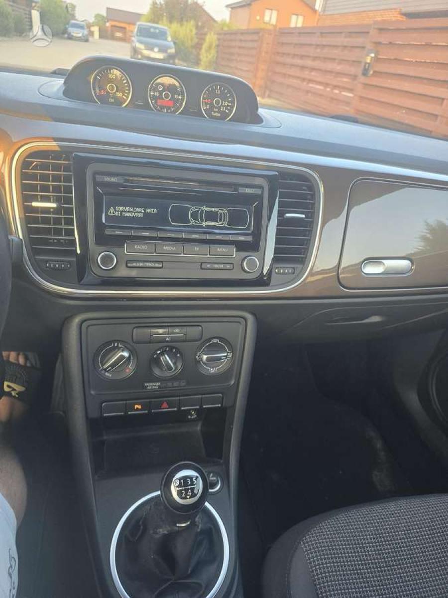 Brown Volkswagen Beetle 2012 in Kaunas, with an engine capacity of 1.60 L and mileage of 165 thousand km for 5999 €, photo 17 on AUTOMOTO.COM.LV