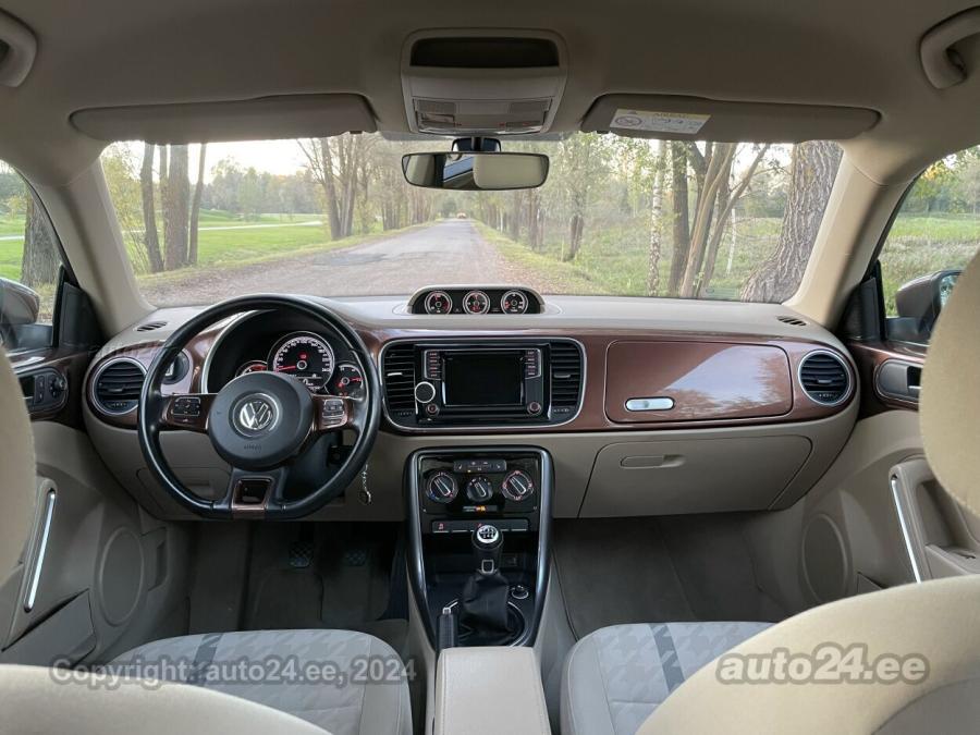Brown Volkswagen Beetle 2017 in Tartu, with an engine capacity of 1.20 L and mileage of 98 thousand km for 13000 €, photo 7 on AUTOMOTO.COM.LV