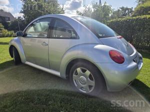 Pelēks Volkswagen Beetle 2003 Rīga, ar dzinēja tilpumu 1.90 L un nobraukumu 245 tūkst. km par 1300 €, foto 5 vietnē AUTOMOTO.COM.LV