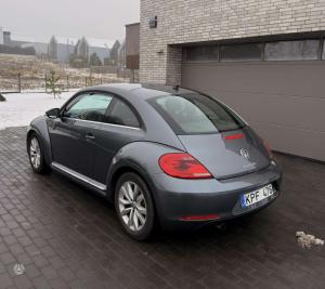 Pelēks Volkswagen Beetle 2013 Viļņa, ar dzinēja tilpumu 0.00 L un nobraukumu 179 tūkst. km par 6900 €, foto  vietnē AUTOMOTO.COM.LV