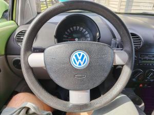 Volkswagen Beetle 2002 in Mazeikiai, with an engine capacity of 1.40 L and mileage of 246 thousand km for 999 €, photo 11 on AUTOMOTO.COM.LV