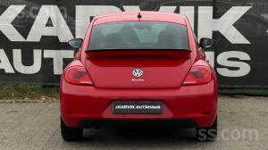 Red Volkswagen Beetle 2015 in Liepaja, with an engine capacity of 1.20 L and mileage of 157 thousand km for 7999 €, photo 6 on AUTOMOTO.COM.LV