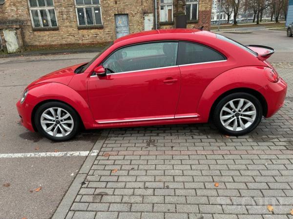 Red Volkswagen Beetle 2015 in Liepaja, with an engine capacity of 1.20 L and mileage of 155 thousand km for 9800 €, photo 1 on AUTOMOTO.COM.LV