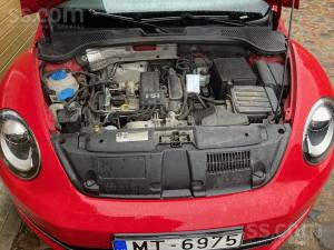 Red Volkswagen Beetle 2015 in Liepaja, with an engine capacity of 1.20 L and mileage of 155 thousand km for 9800 €, photo 8 on AUTOMOTO.COM.LV