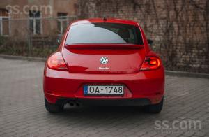Red Volkswagen Beetle 2013 in Riga, with an engine capacity of 1.40 L and mileage of 159 thousand km for 3800 €, photo 22 on AUTOMOTO.COM.LV