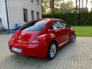 Red Volkswagen Beetle 2014 in Riga, with an engine capacity of 1.20 L and mileage of 200 thousand km for 5500 €, photo 6 on AUTOMOTO.COM.LV
