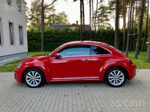 Red Volkswagen Beetle 2014 in Riga, with an engine capacity of 1.20 L and mileage of 200 thousand km for 5500 €, photo 14 on AUTOMOTO.COM.LV