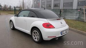 White Volkswagen Beetle 2013 in Riga, with an engine capacity of 1.60 L and mileage of 254 thousand km for 6350 €, photo 19 on AUTOMOTO.COM.LV