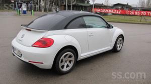 White Volkswagen Beetle 2013 in Riga, with an engine capacity of 1.60 L and mileage of 254 thousand km for 6350 €, photo 23 on AUTOMOTO.COM.LV