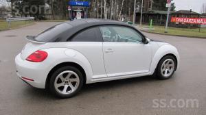 White Volkswagen Beetle 2013 in Riga, with an engine capacity of 1.60 L and mileage of 254 thousand km for 6350 €, photo 24 on AUTOMOTO.COM.LV