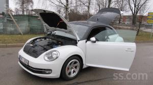 White Volkswagen Beetle 2013 in Riga, with an engine capacity of 1.60 L and mileage of 254 thousand km for 6350 €, photo 30 on AUTOMOTO.COM.LV