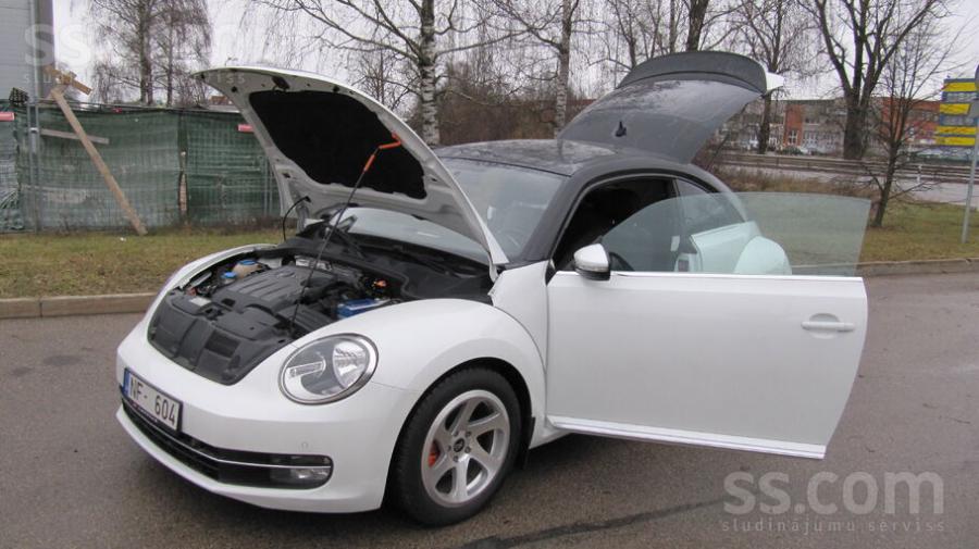 White Volkswagen Beetle 2013 in Riga, with an engine capacity of 1.60 L and mileage of 254 thousand km for 6350 €, photo 31 on AUTOMOTO.COM.LV