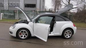 White Volkswagen Beetle 2013 in Riga, with an engine capacity of 1.60 L and mileage of 254 thousand km for 6350 €, photo 32 on AUTOMOTO.COM.LV