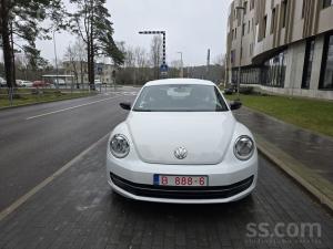 White Volkswagen Beetle 2011 in Riga, with an engine capacity of 2.00 L and mileage of 250 thousand km for 7200 €, photo 2 on AUTOMOTO.COM.LV