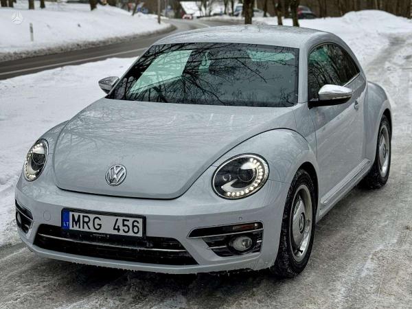 White Volkswagen Beetle 2017 in Vilnius, with an engine capacity of 1.40 L and mileage of 86 thousand km for 15500 €, photo 2 on AUTOMOTO.COM.LV