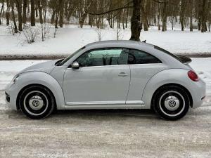 White Volkswagen Beetle 2017 in Vilnius, with an engine capacity of 1.40 L and mileage of 86 thousand km for 15500 €, photo 3 on AUTOMOTO.COM.LV
