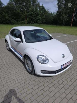 White Volkswagen Beetle 2012 in Vilnius, with an engine capacity of 1.20 L and mileage of 190 thousand km for 5850 €, photo  on AUTOMOTO.COM.LV