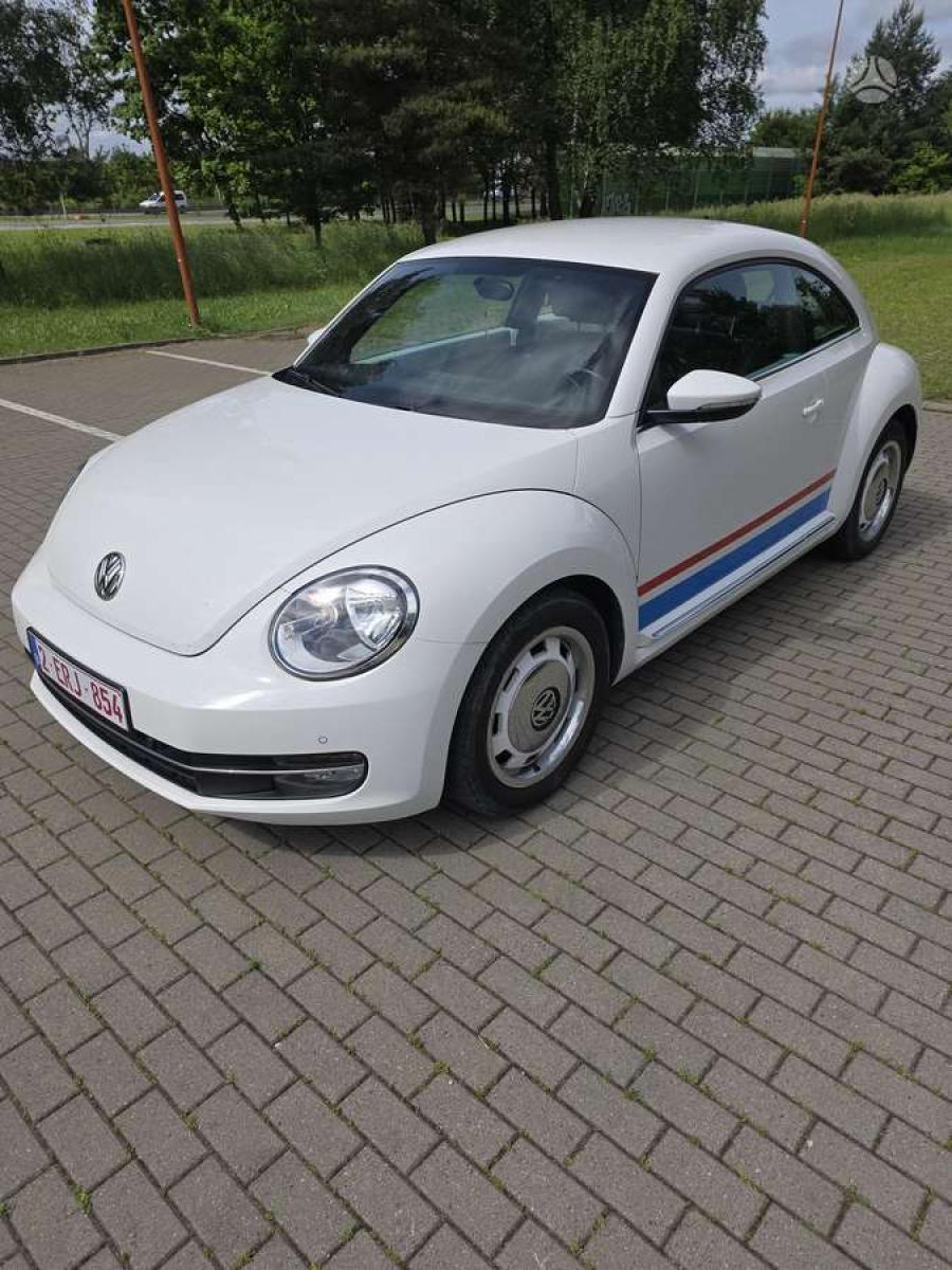 White Volkswagen Beetle 2012 in Vilnius, with an engine capacity of 1.20 L and mileage of 190 thousand km for 5850 €, photo 3 on AUTOMOTO.COM.LV