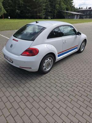 White Volkswagen Beetle 2012 in Vilnius, with an engine capacity of 1.20 L and mileage of 190 thousand km for 5850 €, photo 4 on AUTOMOTO.COM.LV