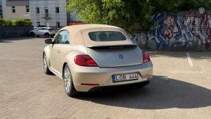 Yellow Volkswagen Beetle 2013 in Vilnius, with an engine capacity of 1.97 L and mileage of 185 thousand km for 8000 €, photo 4 on AUTOMOTO.COM.LV
