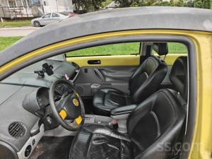 Yellow Volkswagen Beetle 2000 in Riga, with an engine capacity of 2.00 L and mileage of 198 thousand km for 455 €, photo 4 on AUTOMOTO.COM.LV