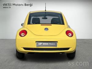 Yellow Volkswagen Beetle 2009 in Riga, with an engine capacity of 1.60 L and mileage of 121 thousand km for 5990 €, photo 5 on AUTOMOTO.COM.LV