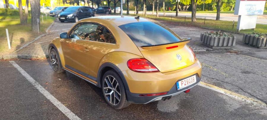 Yellow Volkswagen Beetle 2017 in Ukmerge, with an engine capacity of 1.80 L and mileage of 115 thousand km for 9999 €, photo 2 on AUTOMOTO.COM.LV