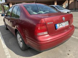 Sarkans Volkswagen Bora 1998 Visaginas, ar dzinēja tilpumu 1.60 L un nobraukumu 237 tūkst. km par 1200 €, foto 5 vietnē AUTOMOTO.COM.LV