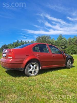 Sarkans Volkswagen Bora 1999 Liepāja, ar dzinēja tilpumu 1.90 L un nobraukumu 398 tūkst. km par 995 €, foto 4 vietnē AUTOMOTO.COM.LV