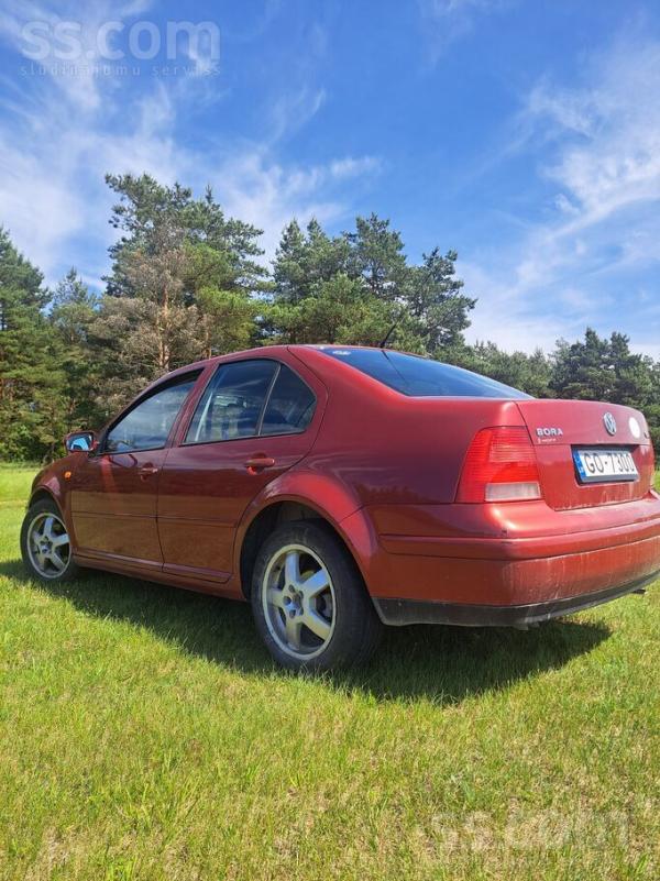 Red Volkswagen Bora 1999 in Liepaja, with an engine capacity of 1.90 L and mileage of 398 thousand km for 995 €, photo 4 on AUTOMOTO.COM.LV