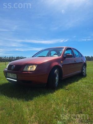 Sarkans Volkswagen Bora 1999 Liepāja, ar dzinēja tilpumu 1.90 L un nobraukumu 398 tūkst. km par 995 €, foto 7 vietnē AUTOMOTO.COM.LV