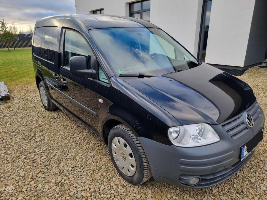 Black Volkswagen Caddy 2011 in Mazeikiai, with an engine capacity of 2.00 L and mileage of 206 thousand km for 5000 €, photo 1 on AUTOMOTO.COM.LV