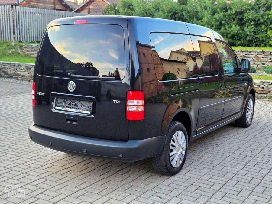 Black Volkswagen Caddy 2011 in Vilnius, with an engine capacity of 1.60 L and mileage of 283 thousand km for 6999 €, photo 9 on AUTOMOTO.COM.LV