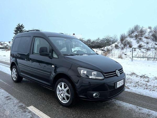 Black Volkswagen Caddy 2011 in Ukmerge, with an engine capacity of 1.60 L and mileage of 173 thousand km for 5550 €, photo 1 on AUTOMOTO.COM.LV