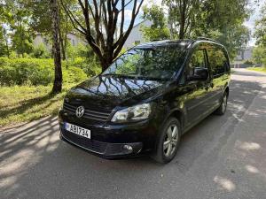 Black Volkswagen Caddy 2011 in Vilnius, with an engine capacity of 1.60 L and mileage of 327 thousand km for 5900 €, photo 3 on AUTOMOTO.COM.LV