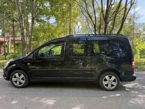 Black Volkswagen Caddy 2011 in Vilnius, with an engine capacity of 1.60 L and mileage of 327 thousand km for 5900 €, photo 7 on AUTOMOTO.COM.LV