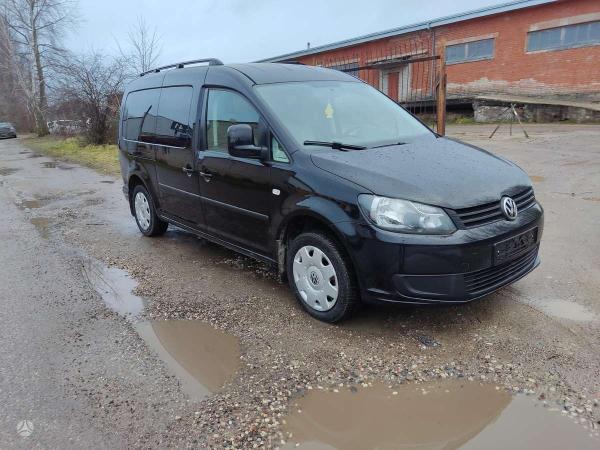 Black Volkswagen Caddy 2012 in Ukmerge, with an engine capacity of 1.60 L and mileage of 250 thousand km for 6900 €, photo 1 on AUTOMOTO.COM.LV