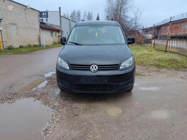 Black Volkswagen Caddy 2012 in Ukmerge, with an engine capacity of 1.60 L and mileage of 250 thousand km for 6900 €, photo 2 on AUTOMOTO.COM.LV