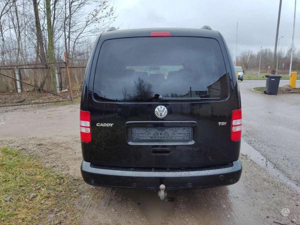 Black Volkswagen Caddy 2012 in Ukmerge, with an engine capacity of 1.60 L and mileage of 250 thousand km for 6900 €, photo 3 on AUTOMOTO.COM.LV
