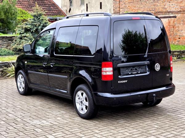 Black Volkswagen Caddy 2012 in Vilnius, with an engine capacity of 1.60 L and mileage of 248 thousand km for 6650 €, photo 5 on AUTOMOTO.COM.LV