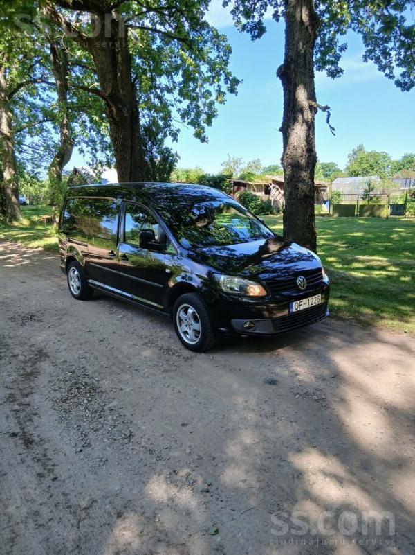 Black Volkswagen Caddy 2012 in Valmiera, with an engine capacity of 2.00 L and mileage of 329 thousand km for 6890 €, photo 2 on AUTOMOTO.COM.LV