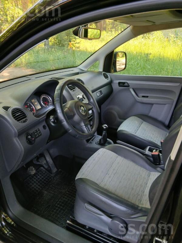 Black Volkswagen Caddy 2012 in Valmiera, with an engine capacity of 2.00 L and mileage of 329 thousand km for 6890 €, photo 7 on AUTOMOTO.COM.LV
