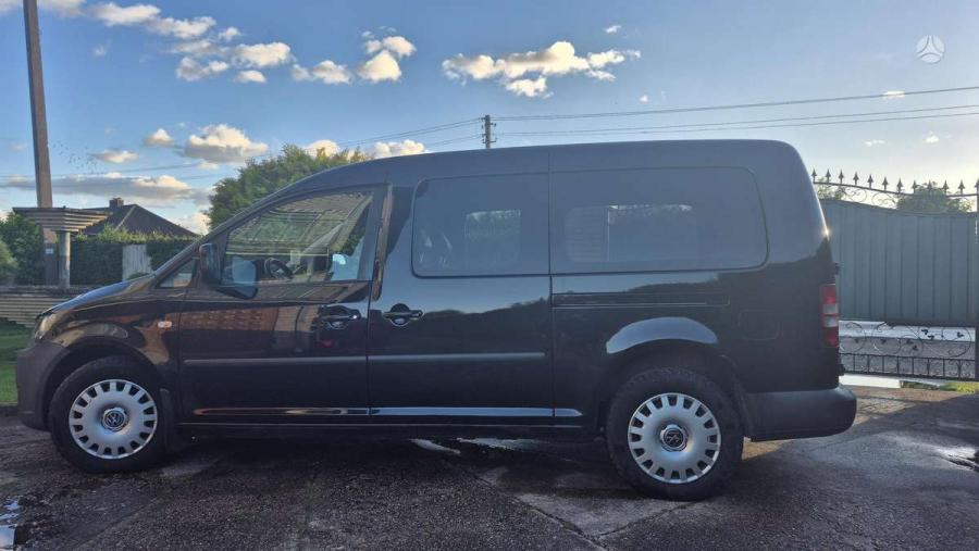 Black Volkswagen Caddy 2013 in Kaunas, with an engine capacity of 2.00 L and mileage of 316 thousand km for 5900 €, photo 4 on AUTOMOTO.COM.LV