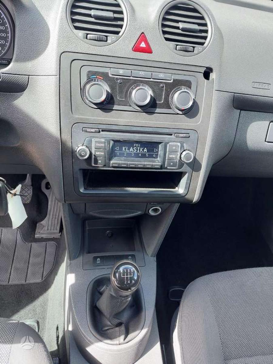 Black Volkswagen Caddy 2013 in Marijampole, with an engine capacity of 1.60 L and mileage of 254 thousand km for 5100 €, photo 10 on AUTOMOTO.COM.LV
