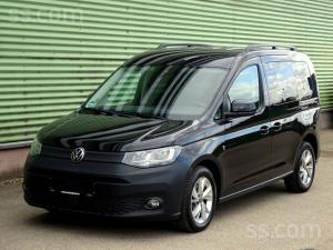 Black Volkswagen Caddy 2022 in Riga, with an engine capacity of 2.00 L and mileage of 129 thousand km for 18900 €, photo  on AUTOMOTO.COM.LV