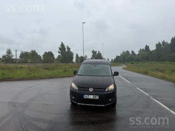 Black Volkswagen Caddy 2013 in Rezekne, with an engine capacity of 1.60 L and mileage of 320 thousand km for 8500 €, photo 1 on AUTOMOTO.COM.LV